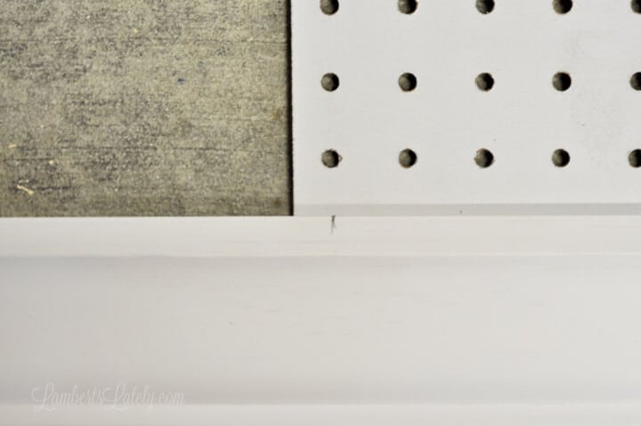 How to Hang a Large Framed Craft Room Pegboard | Lamberts Lately